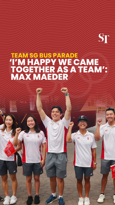 Olympic medallist Max Maeder speaks to media before Team Singapore bus ...